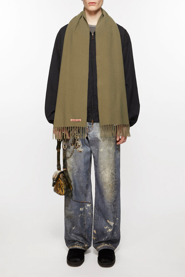 SKINNY FRINGE WOOL SCARF IN KHAKI GREEN - Zambesi Store